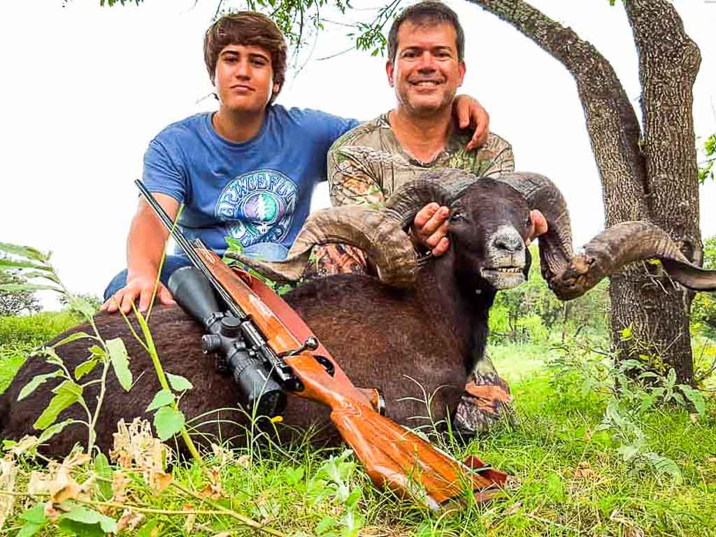 father-son-black-hawaiian-sheep-hunting - OX Ranch
